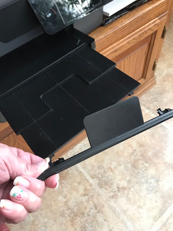 Output tray flip up paper stop has fallen off. Does a spring... - HP ...