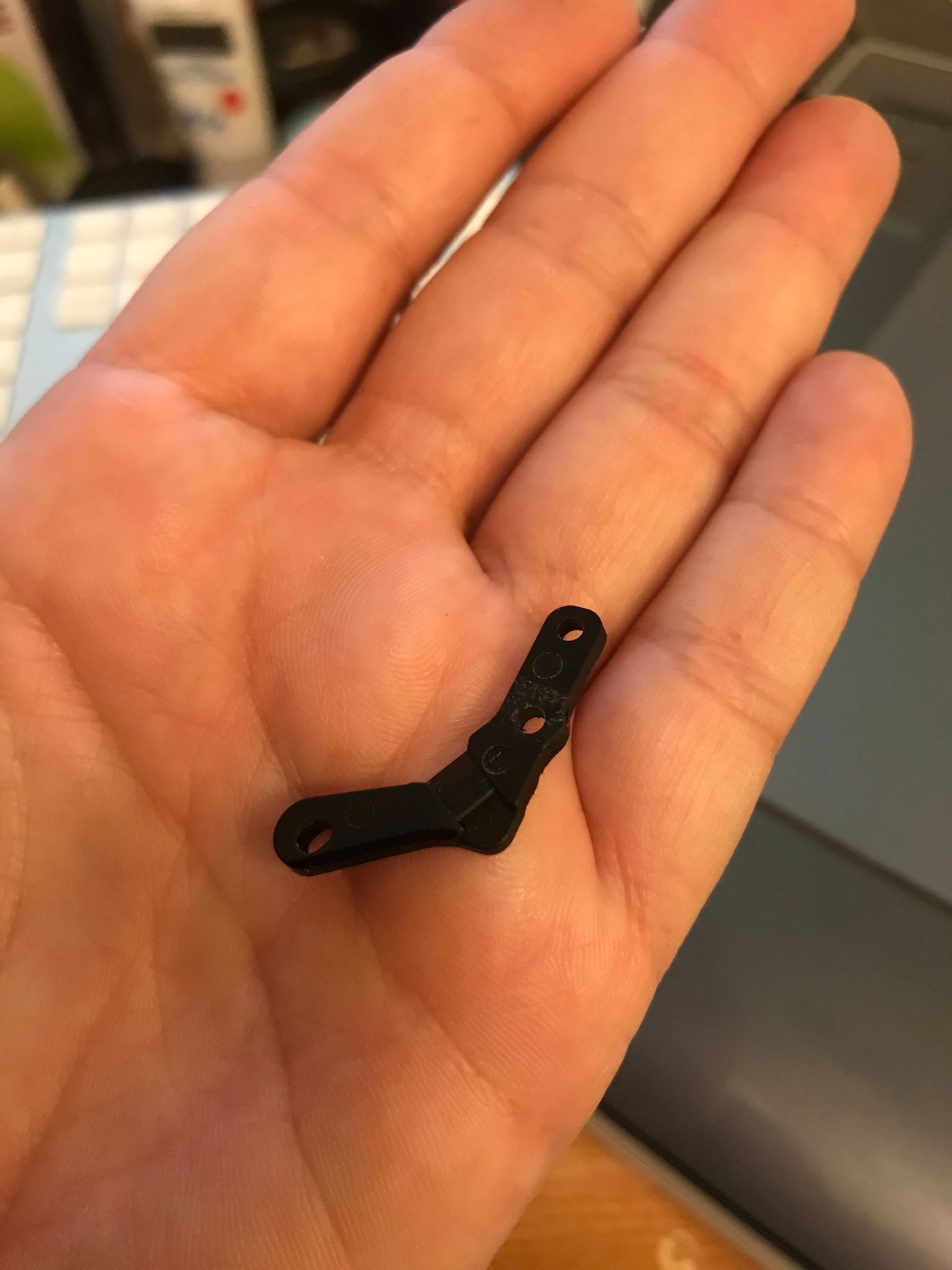 When clearing a paper jam a small boomerang shaped piece fel... - HP ...