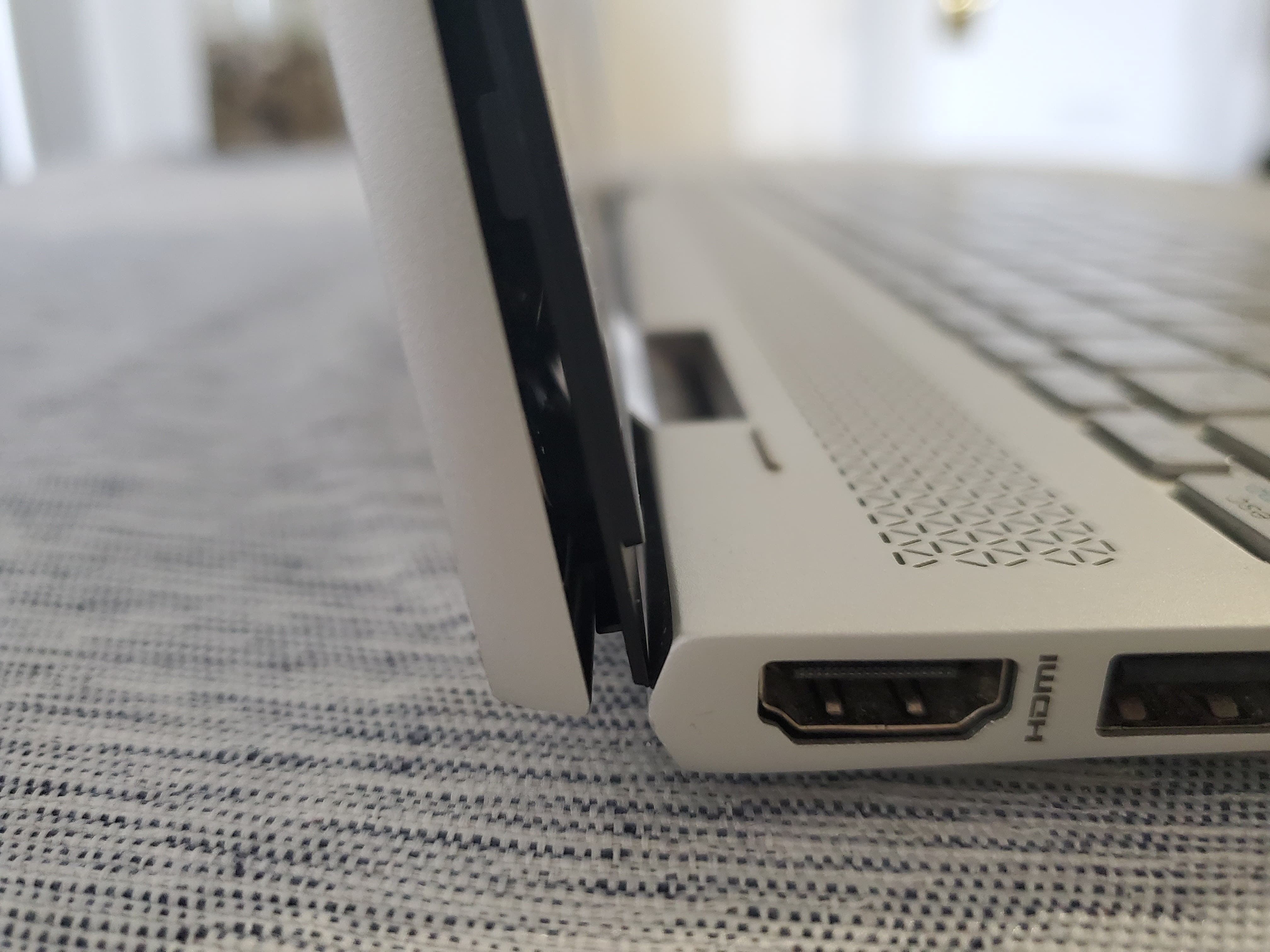 Backside of the left screen (left hinge) is coming apart sud... - HP ...