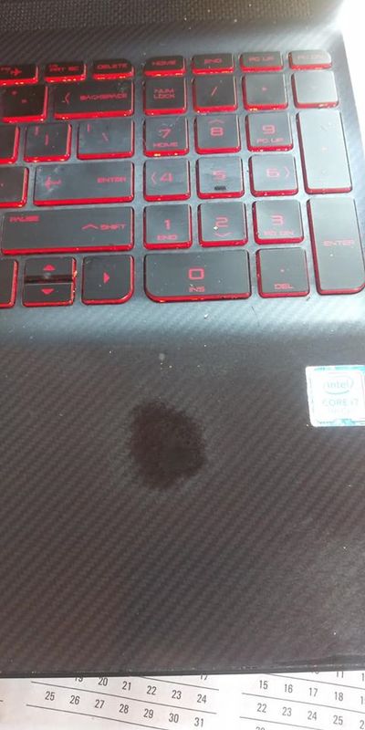 Melted spot on laptop next to touch pad. - HP Support Community - 7381435