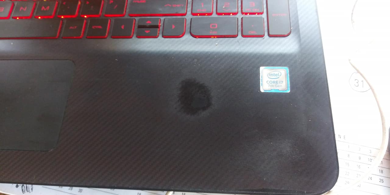 Melted spot on laptop next to touch pad. - HP Support Community - 7381435
