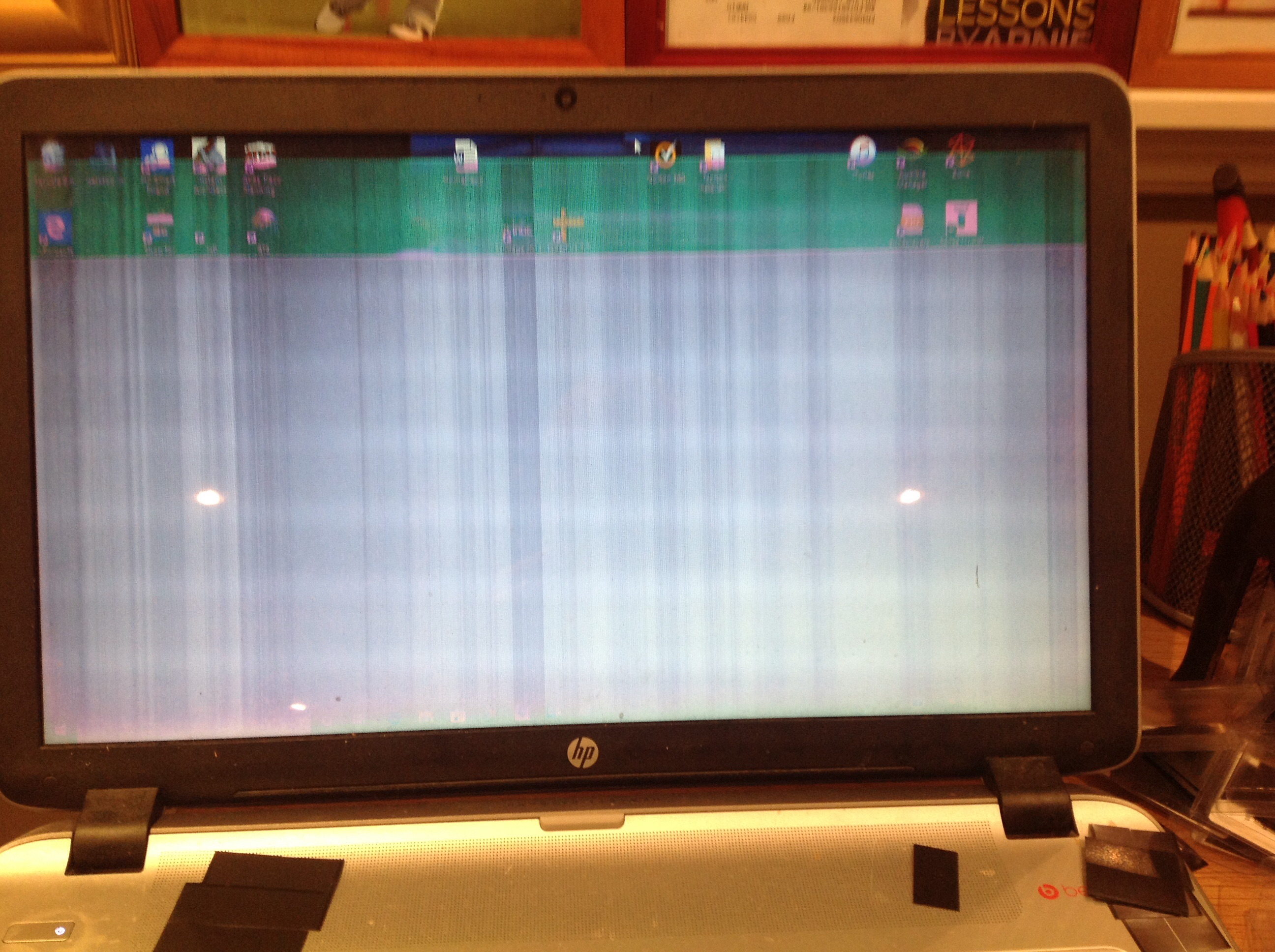 Screen has white or green "blanket" on startup, covers signi... - HP ...