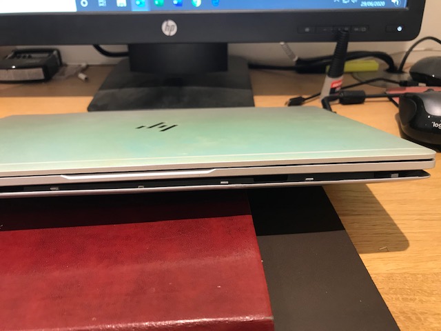 Solved: Bottom cover come away from laptop. Seems to be caused by a ...