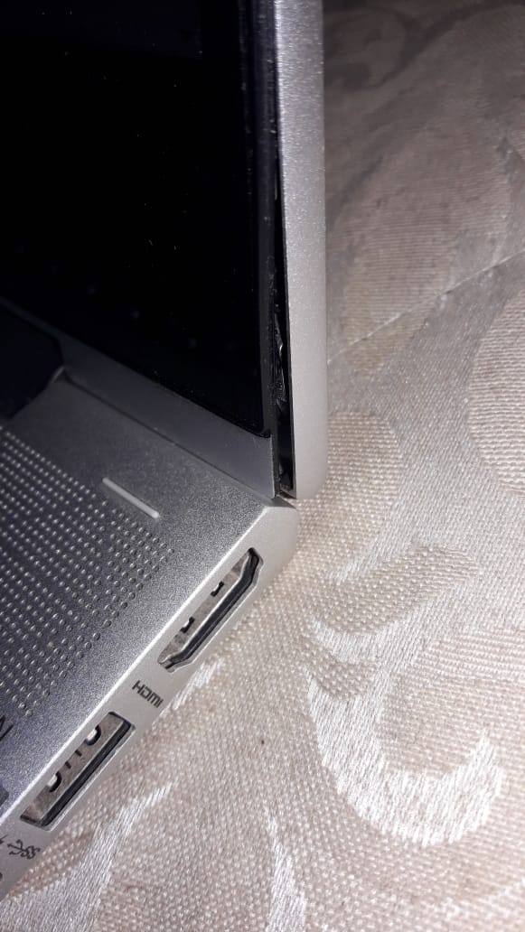 Screen popped out bottom right corner - HP Support Community - 7709944