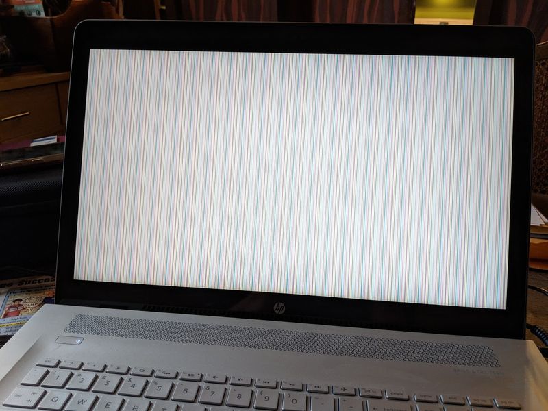 Solved: Vertical Lines in Display - HP Support Community - 7934065