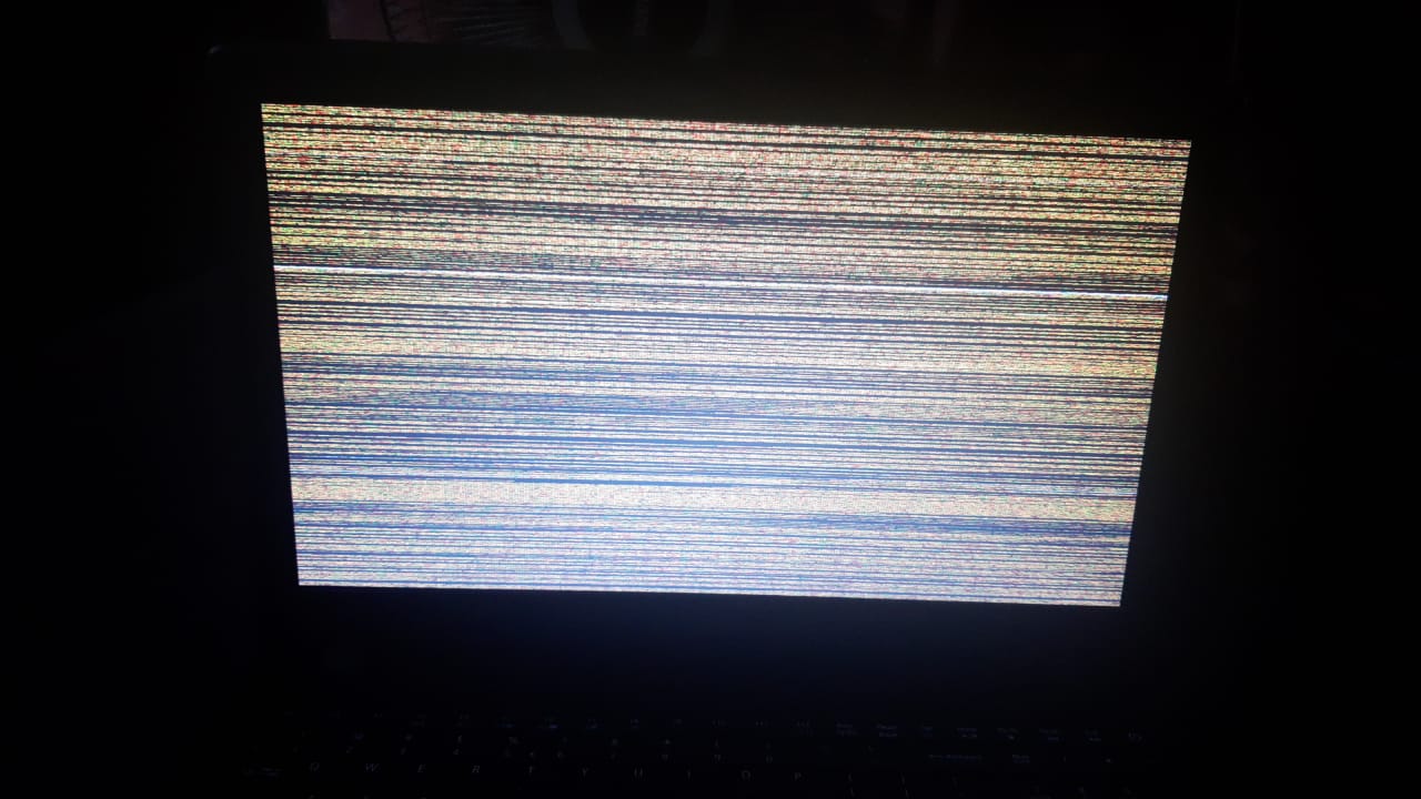 My laptop screen is displaying black and white squares - HP Support ...