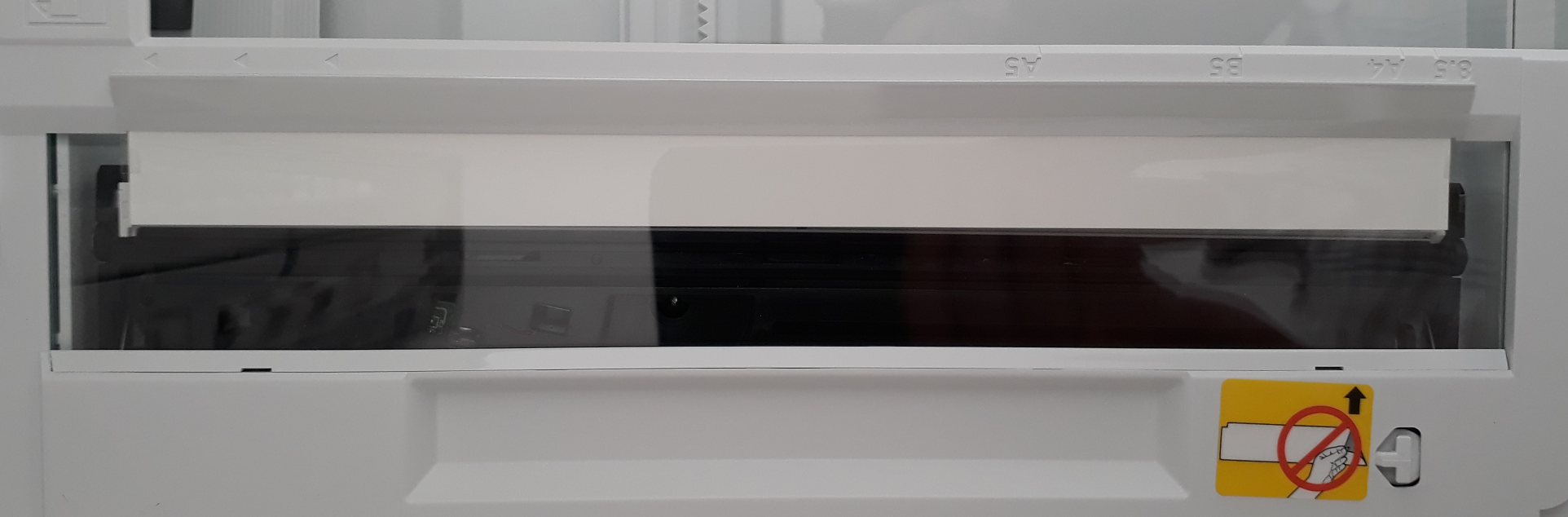 Solved: Vertical red line on scanned pages - HP Support Community - 8312088