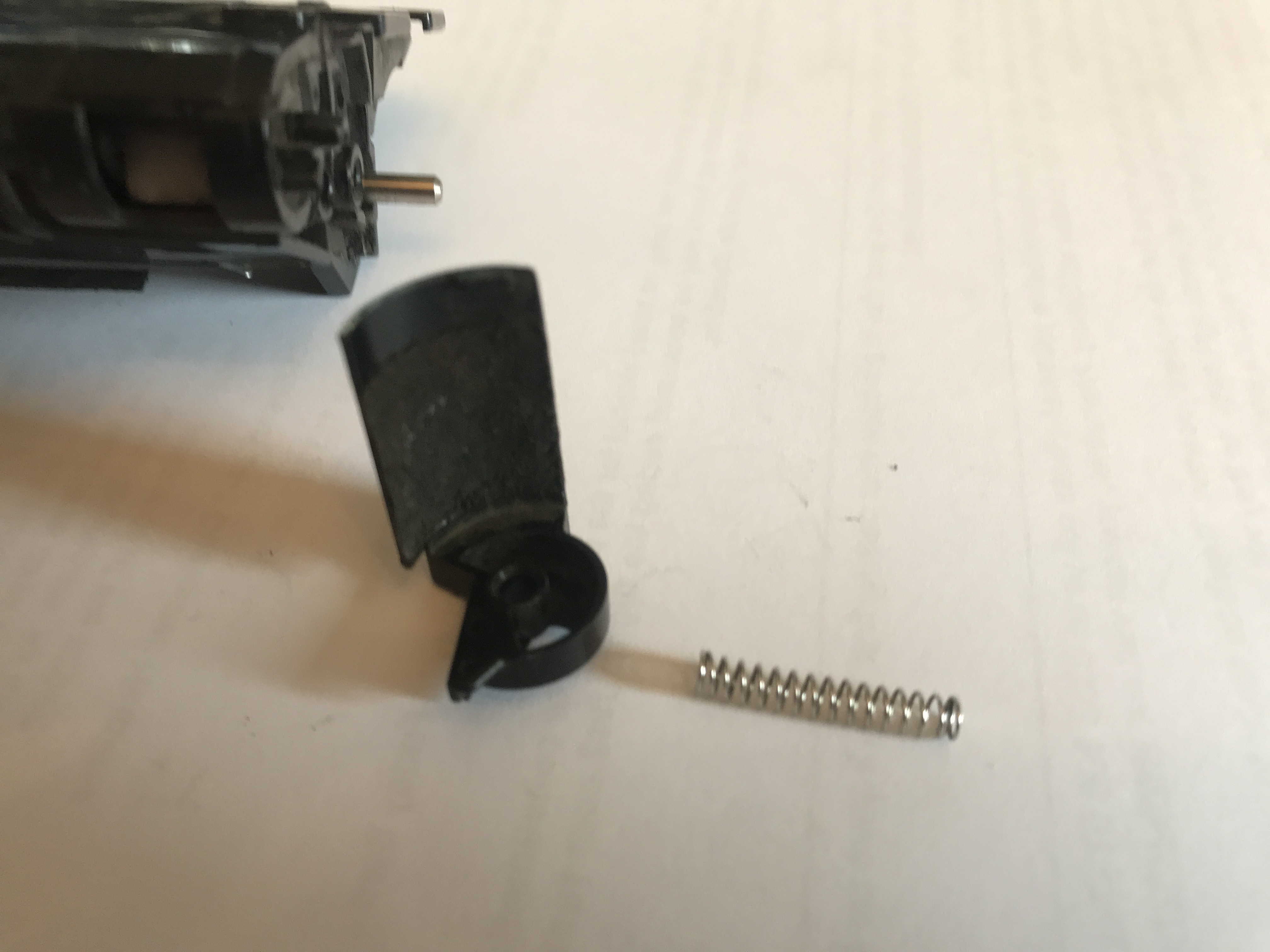 Solved: HP M551 help on where does a spring go - HP Support Community ...