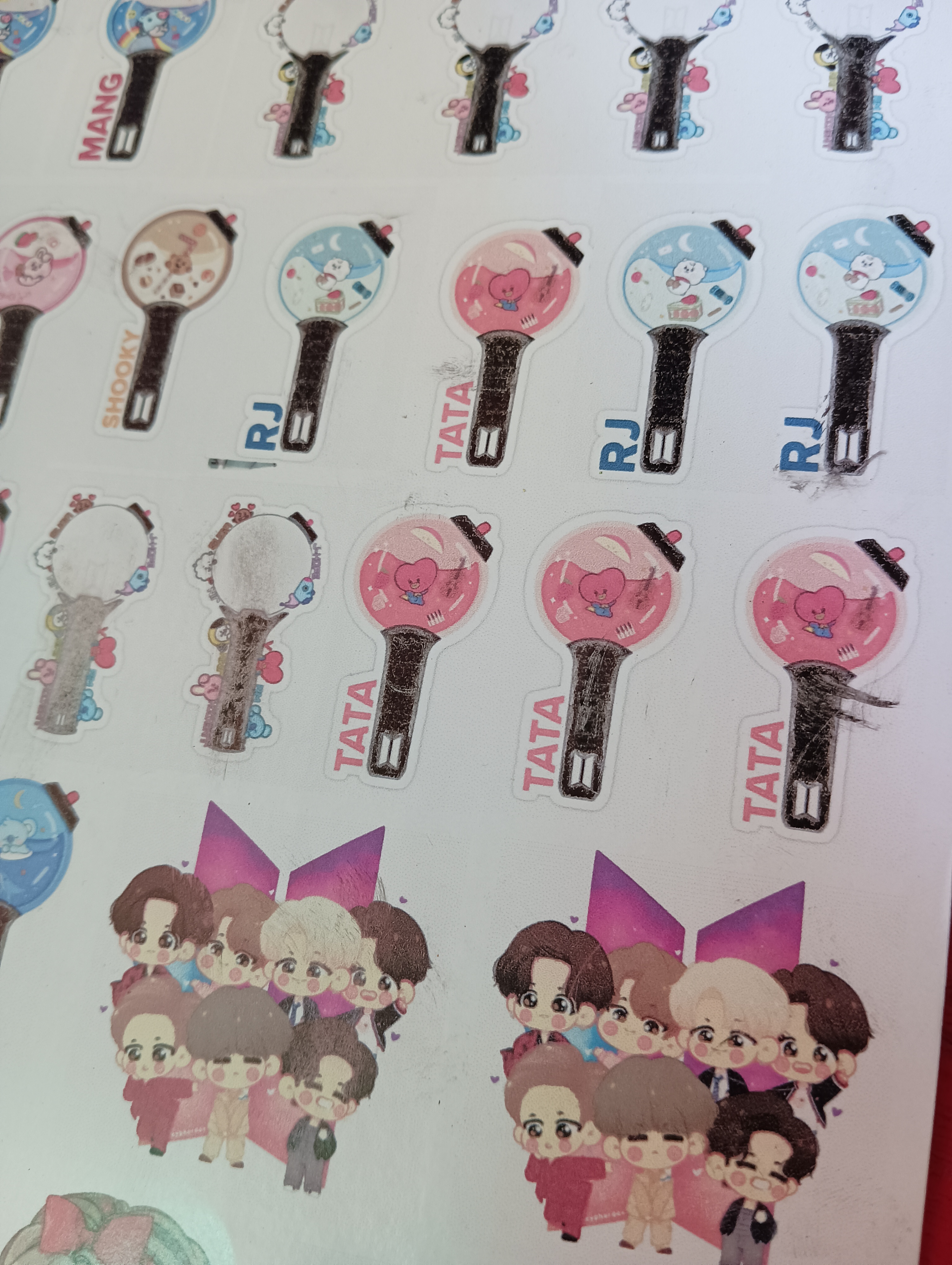 Black ink spread on glossy sticker paper - HP Support Community - 8554166