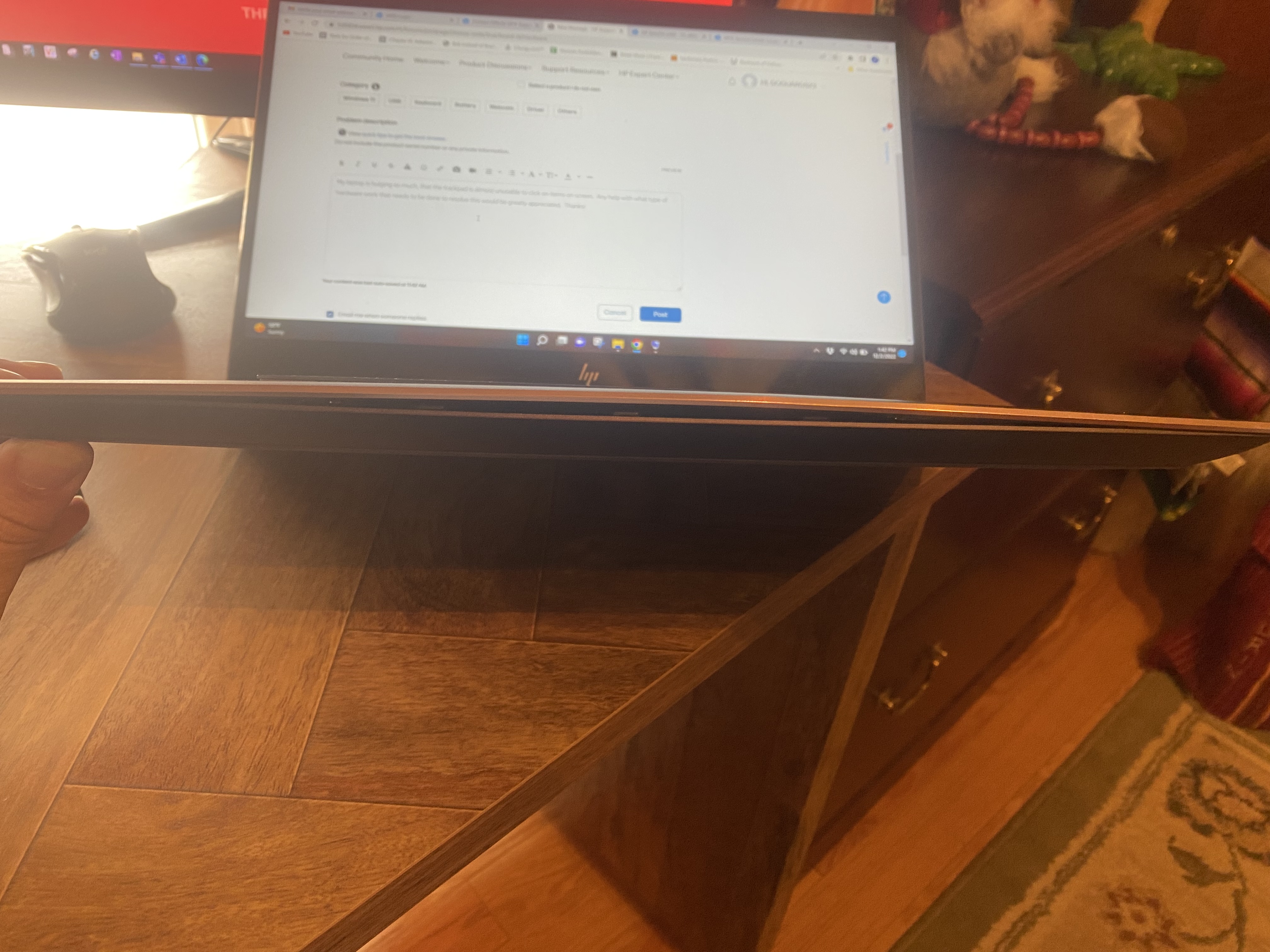 Laptop Bulging Beneath Trackpad - HP Support Community - 8554630