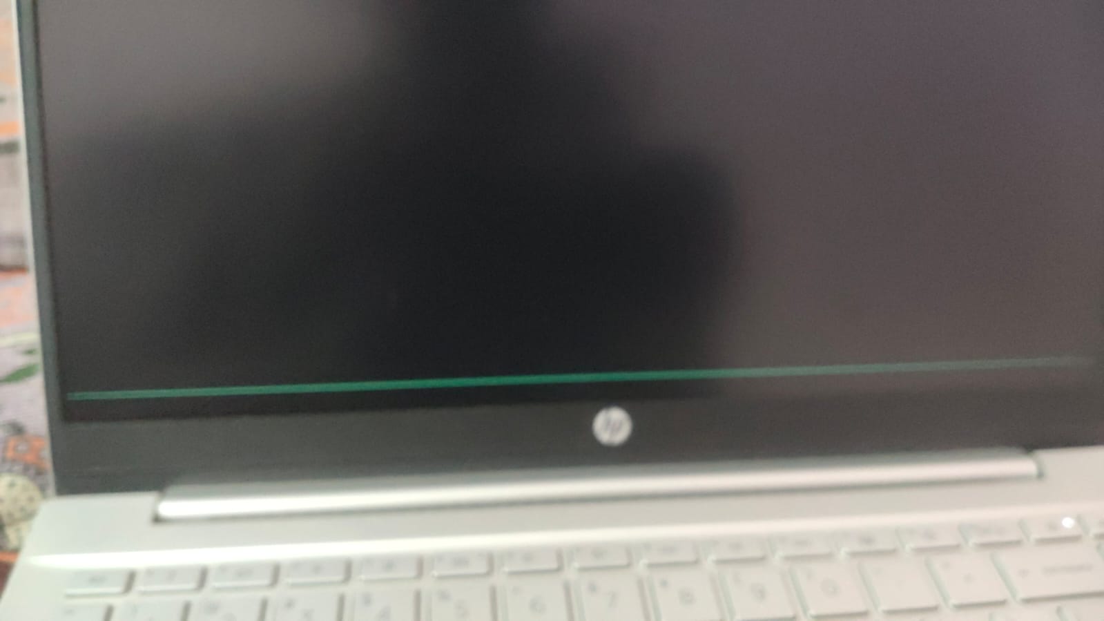 I've got a green line at the bottom of my windows screen, wh... - HP ...