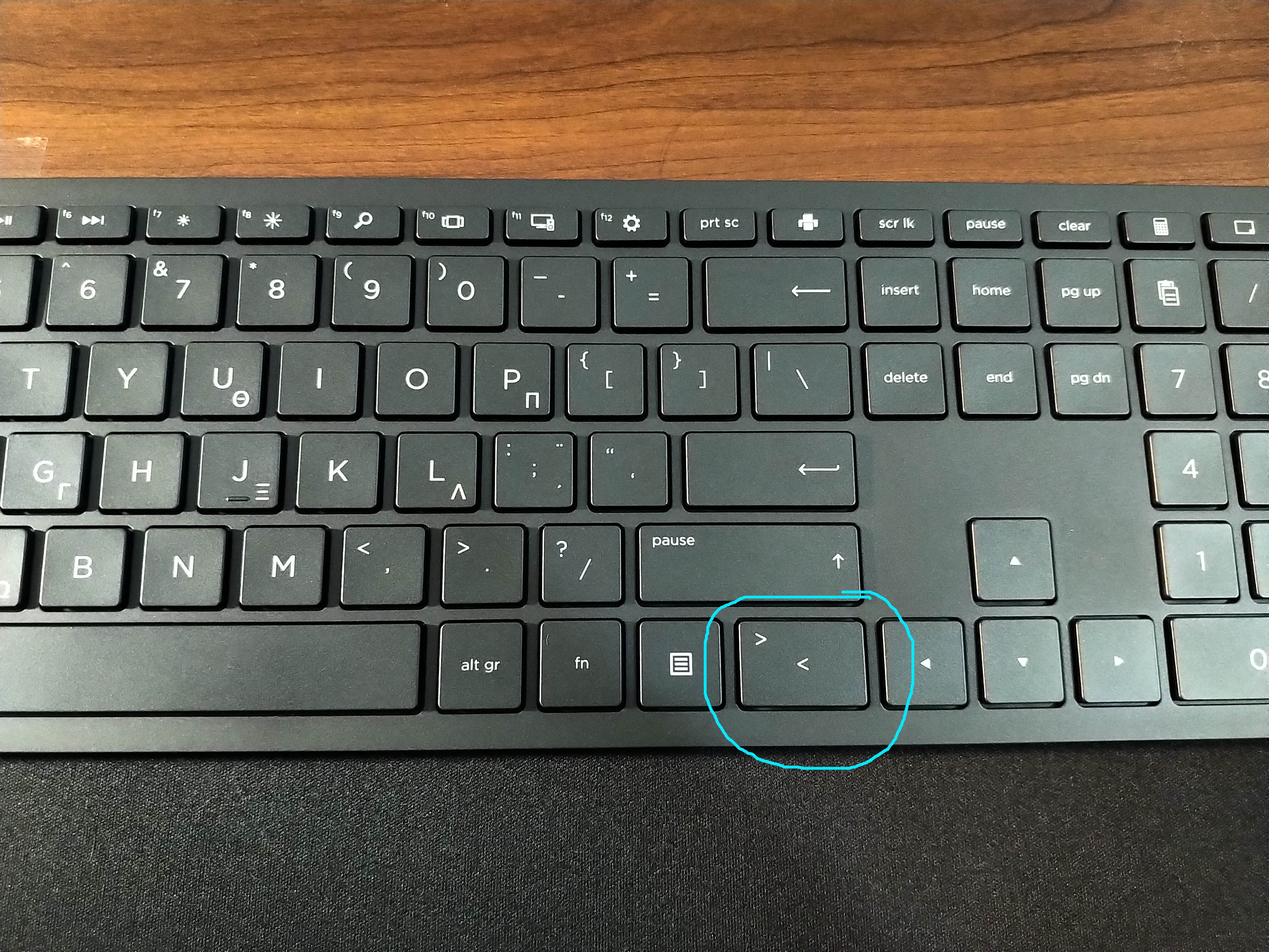 Please help me to identify this strange key on HP HSA-P003K ... - HP ...