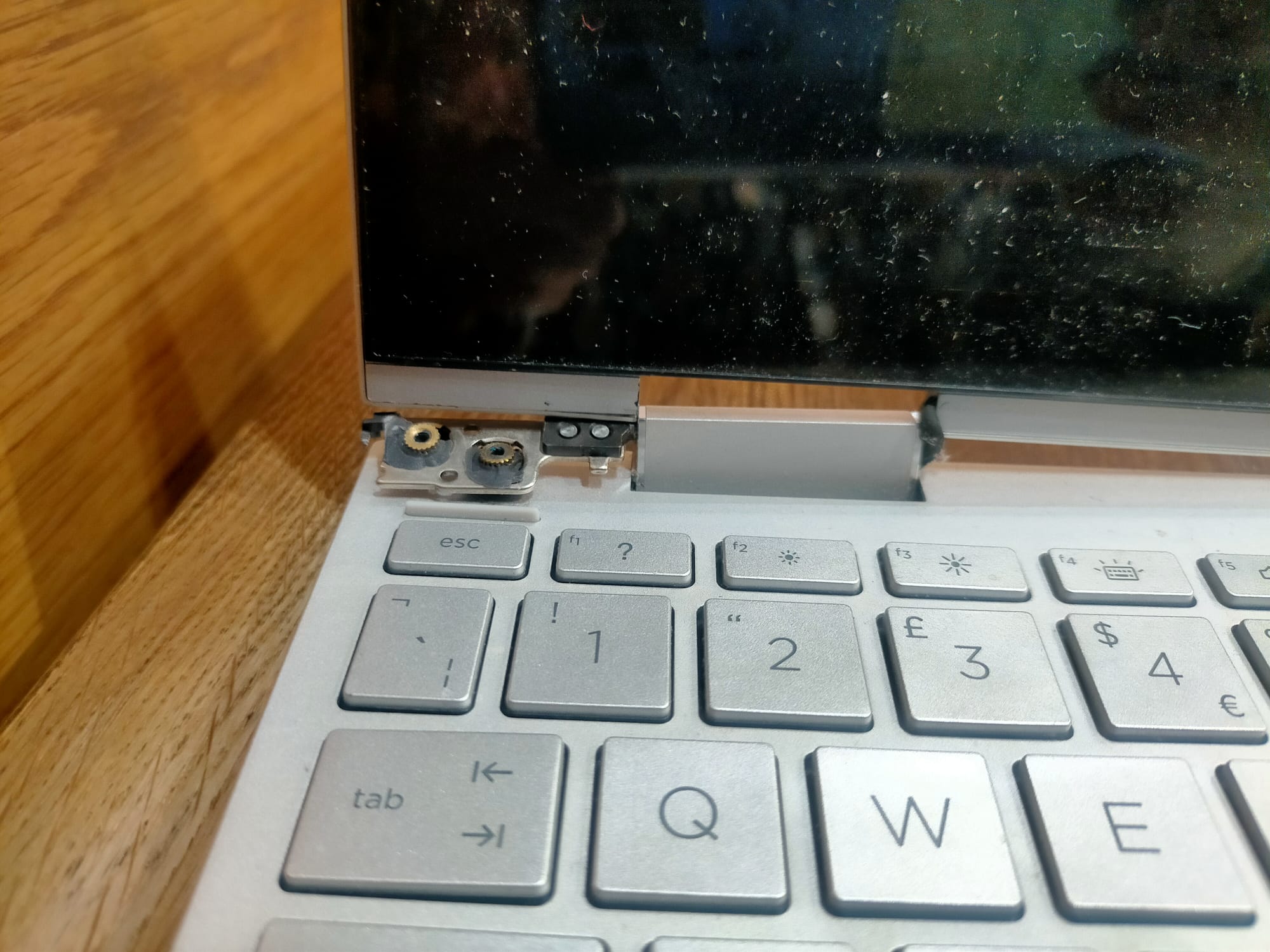 Hp Envy x360 Corner of Laptop is cracked and opening. - HP Support ...