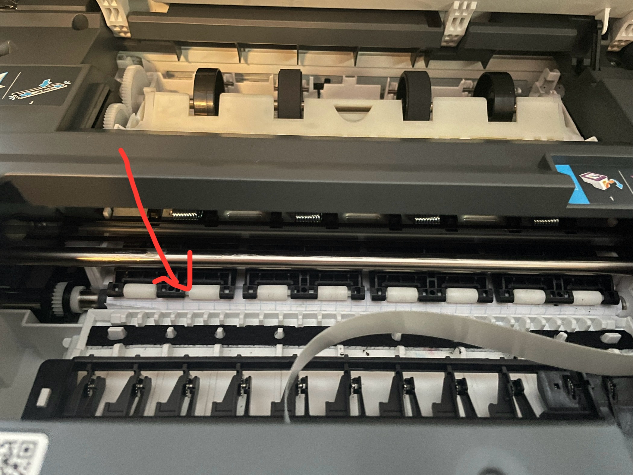 Paper wrapped around bar in printer - HP Support Community - 9029621